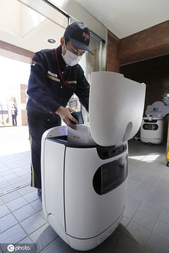日本邮政演示机器人自动配送服务-搜狐大视野-搜狐新闻