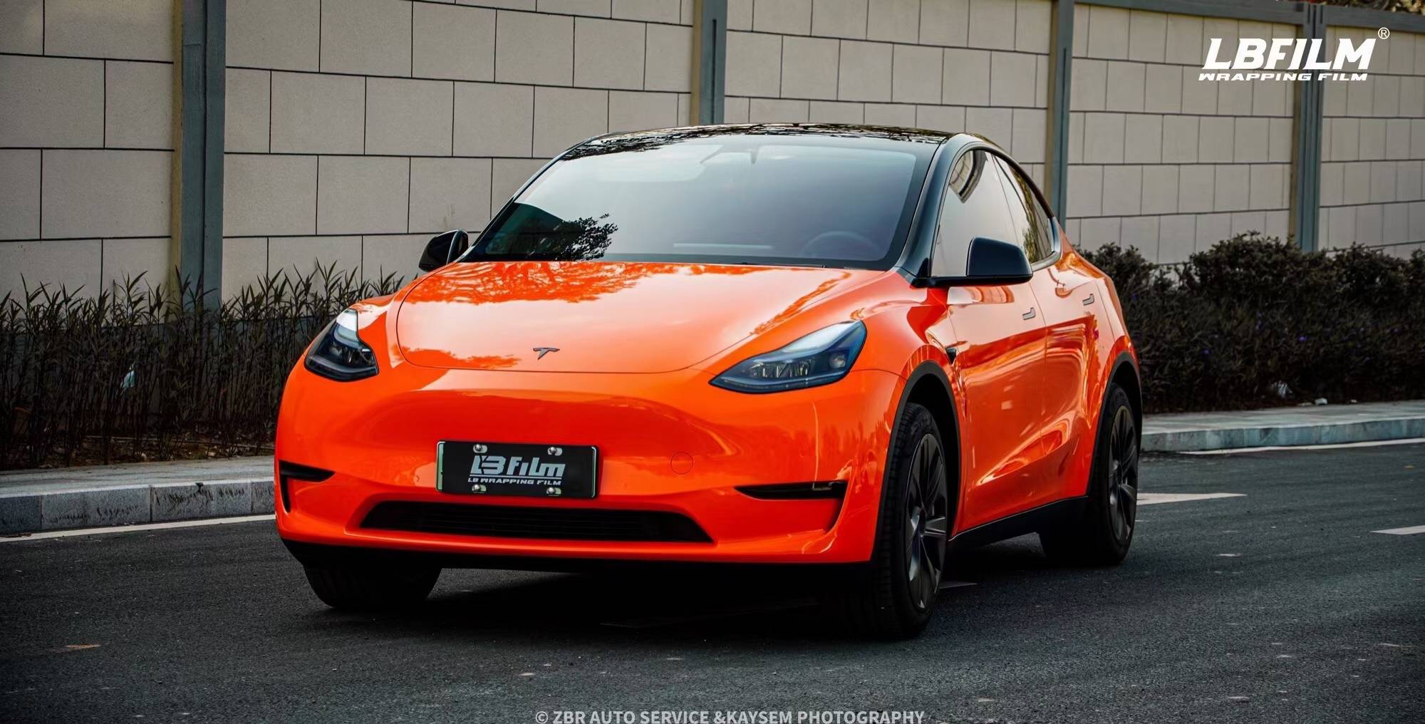 特斯拉modelY-LB改色膜高亮橙，用亮色对撞街头_搜狐汽车_搜狐网