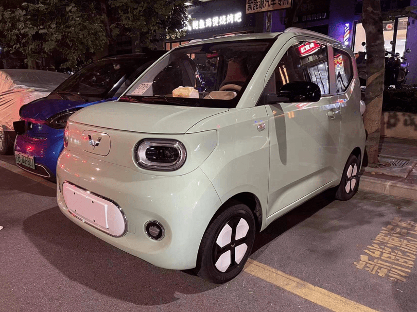 宏光MINIEV第三代马卡龙PK风光MINIEV，谁的细节设计稳压对方一筹？_搜狐汽车_搜狐网